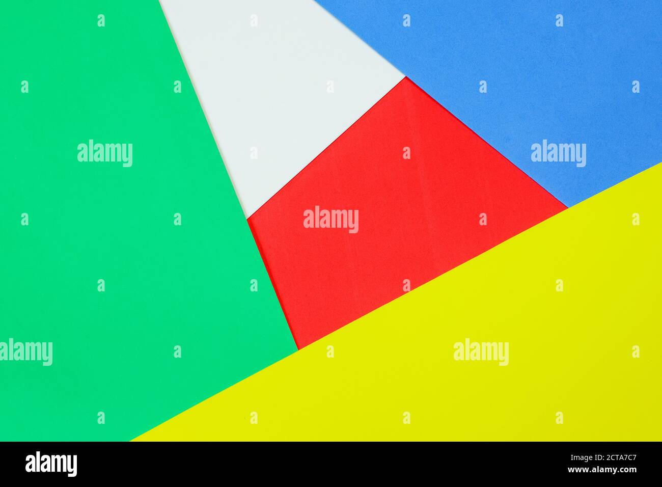 An abstract geometric textured background of red, white,blue, green and ...