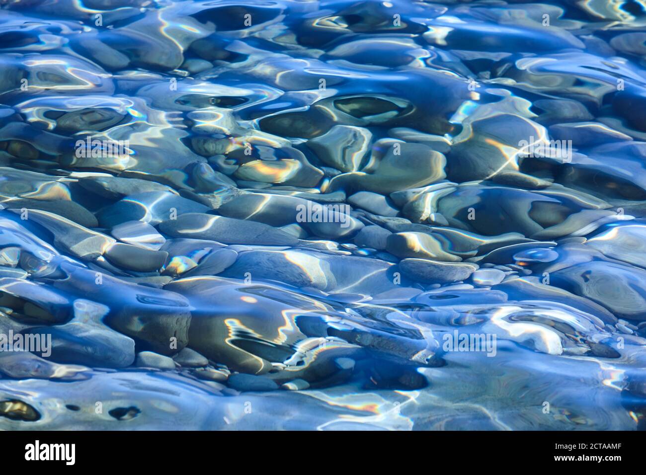 Pebble stone reflections on the water. Nature background. Zen ...