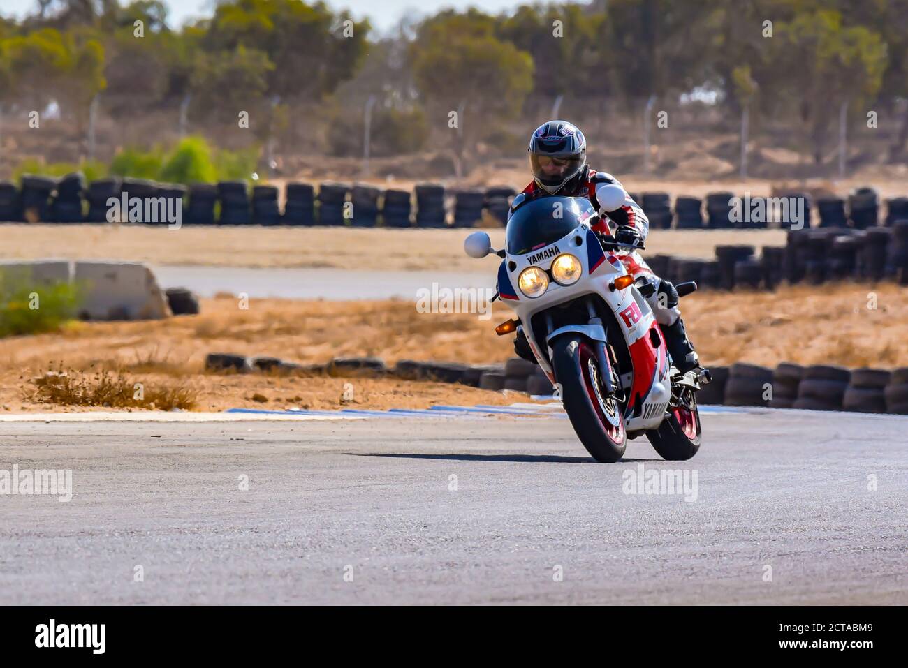 Motorbike racing in circuit. Photographed in Israel Stock Photo - Alamy