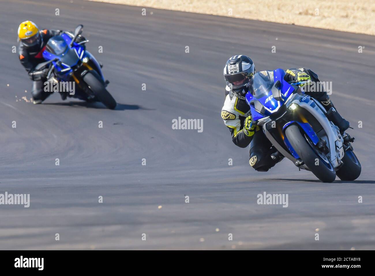 Motorbike racing in circuit. Photographed in Israel Stock Photo - Alamy