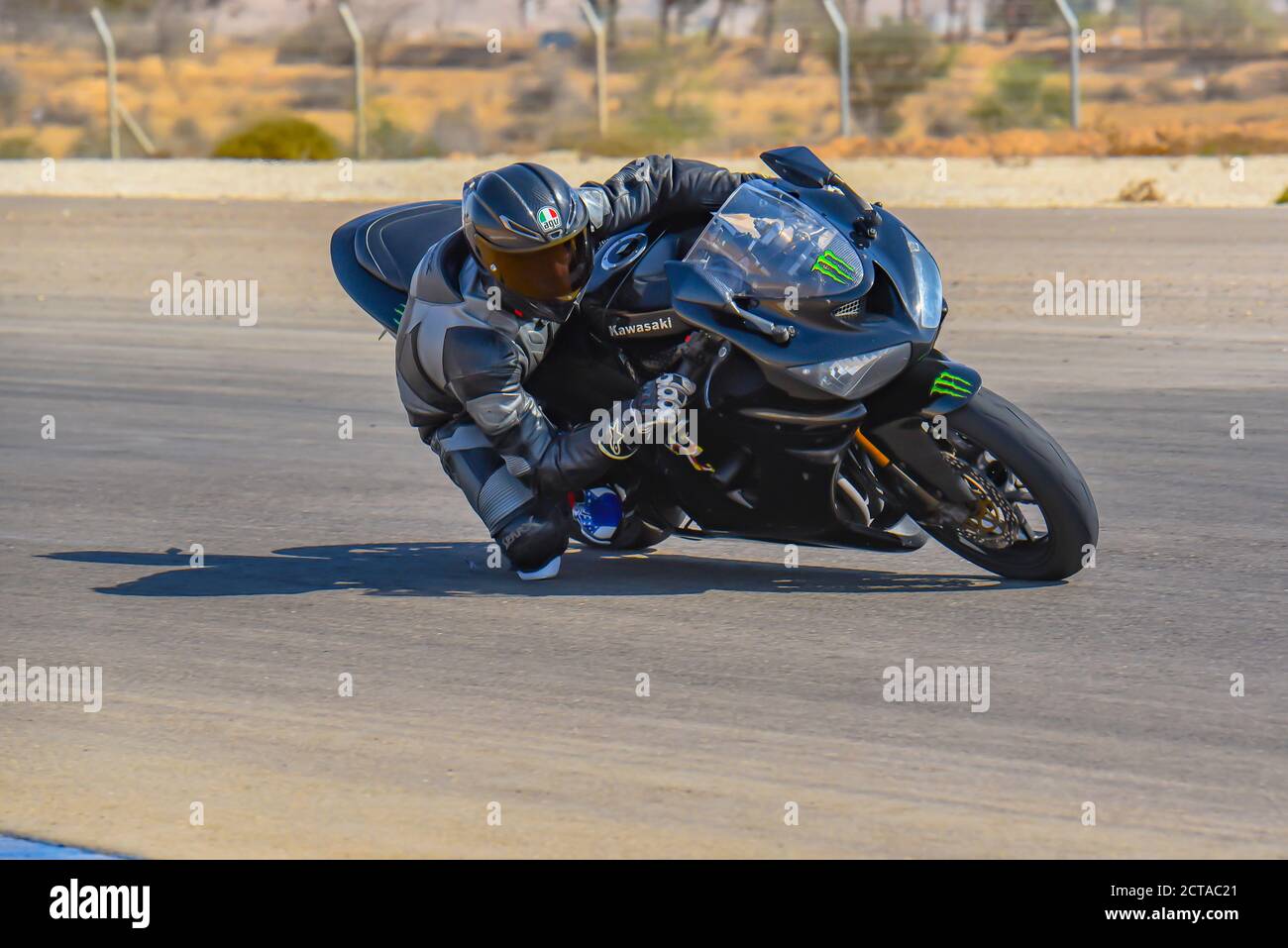 Motorbike racing in circuit. Photographed in Israel Stock Photo - Alamy