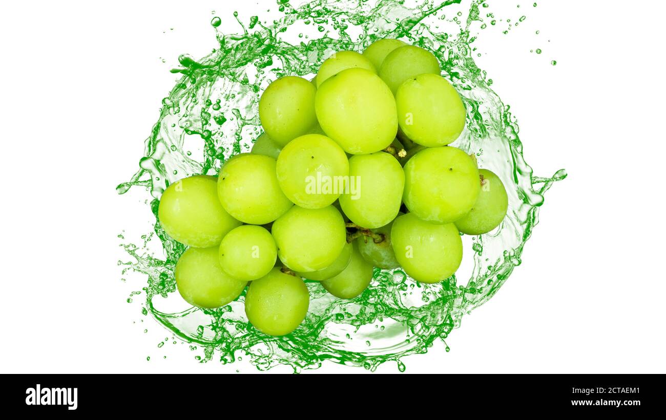Fruit green grape and water splash on white background Stock Photo - Alamy