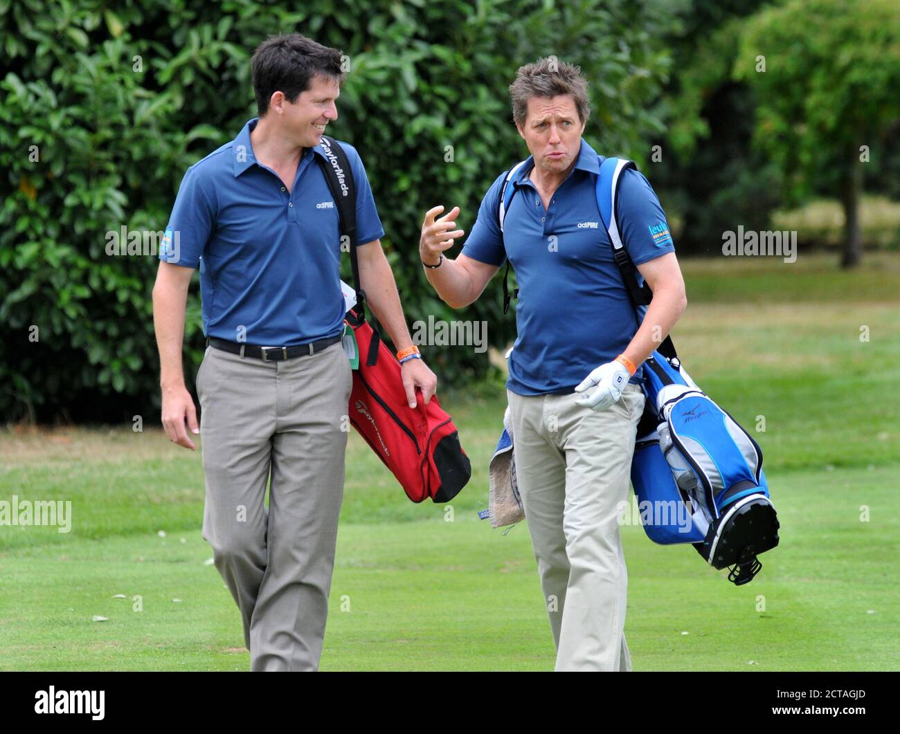 CHISWICK,LONDON,UK: JULY 16th 2010. Tennis star Tim Henman (L) and ...