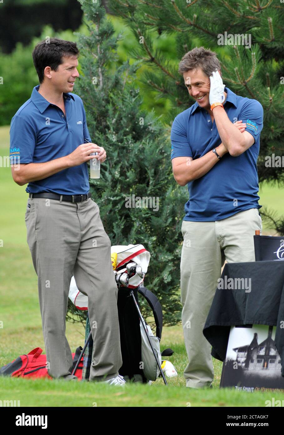 CHISWICK,LONDON,UK: JULY 16th 2010. Tennis star Tim Henman (L) and ...