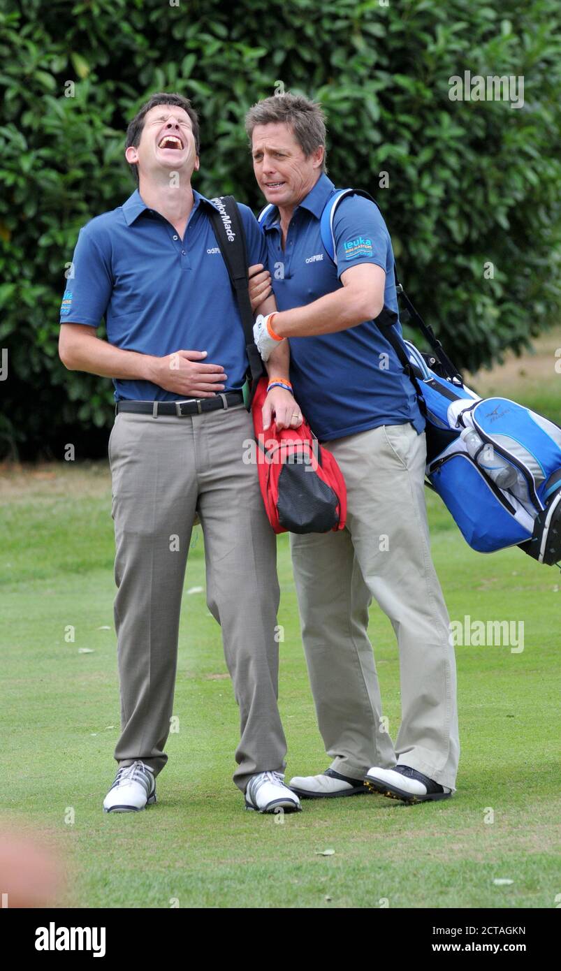 CHISWICK,LONDON,UK: JULY 16th 2010. Tennis star Tim Henman (L) and ...