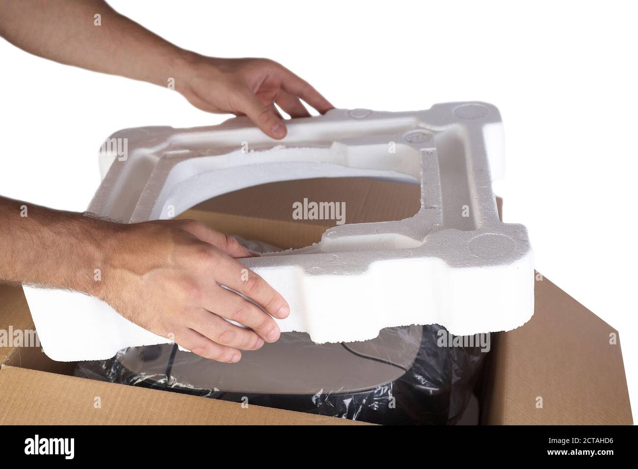 Packing goods in cardboard box with styrofoam material for safe ...