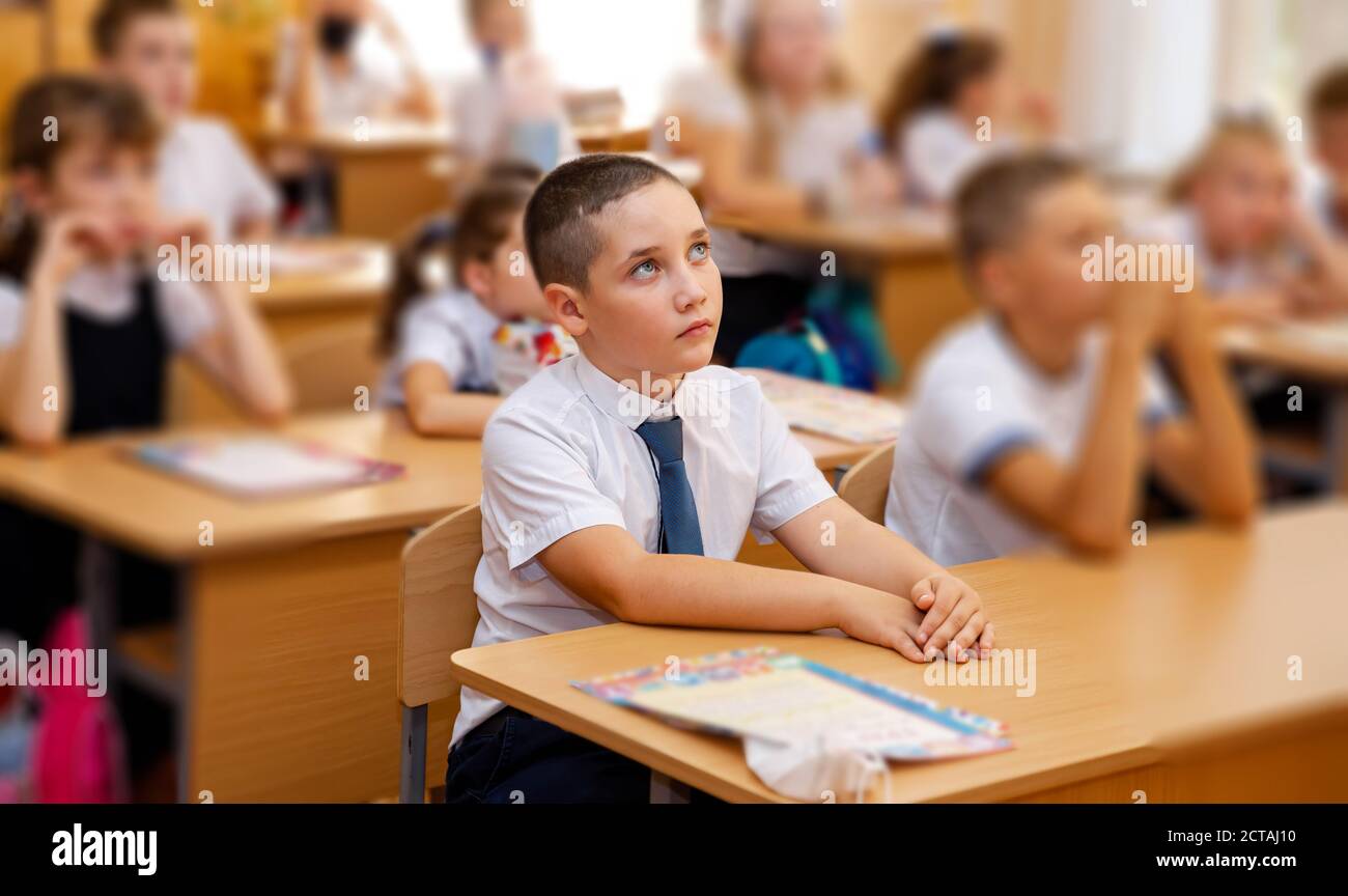 School kids work together on a class project. Pupils passing exam Stock ...