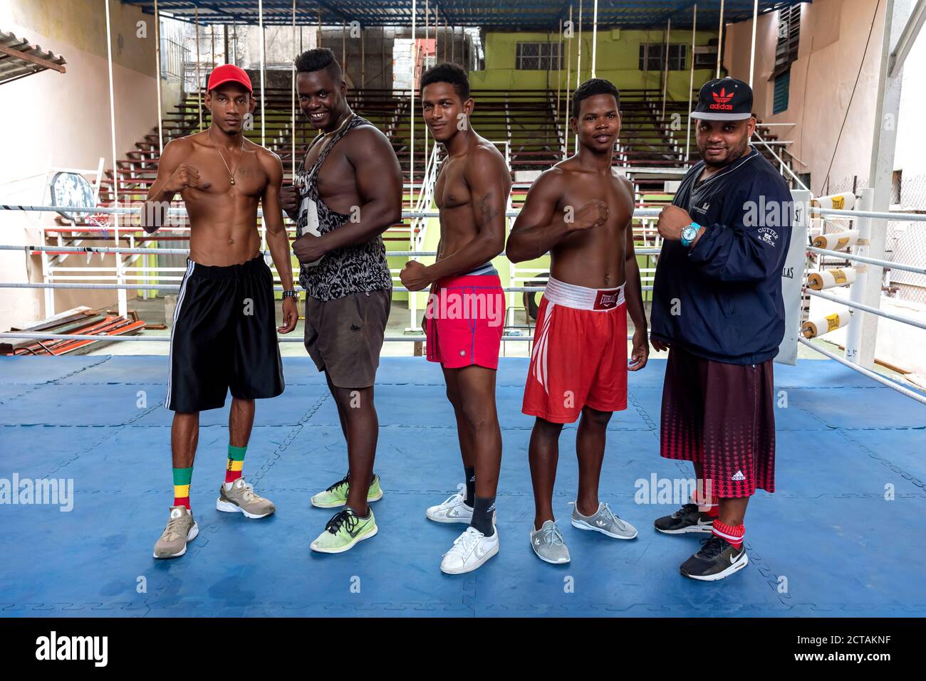 September 4, 2019: Group of boxers looking at camera above the ring ...