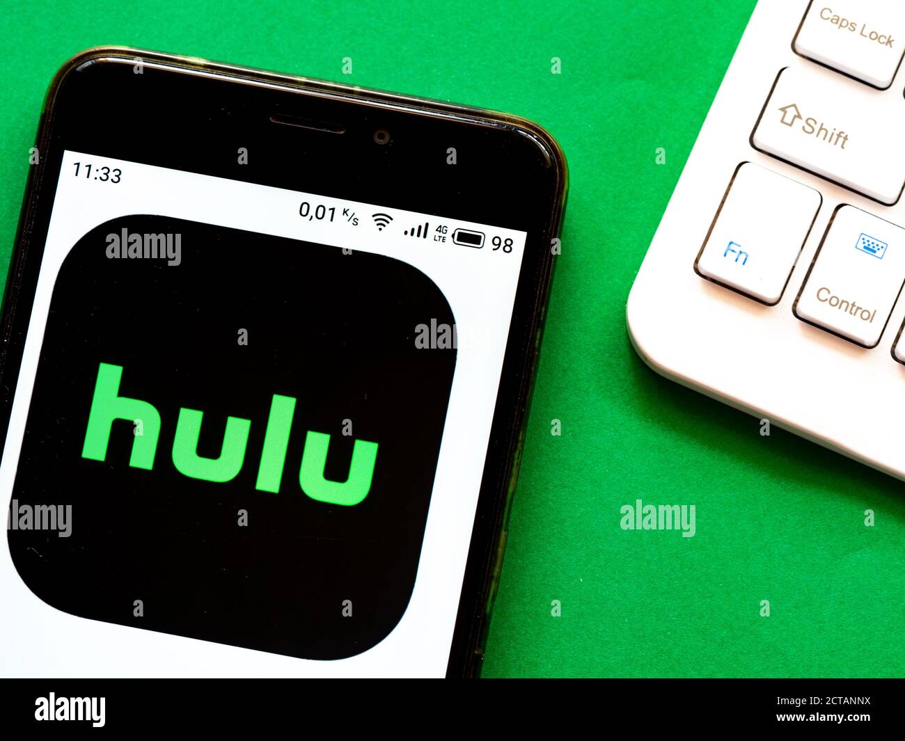 In this photo illustration a Hulu logo is seen displayed on a ...