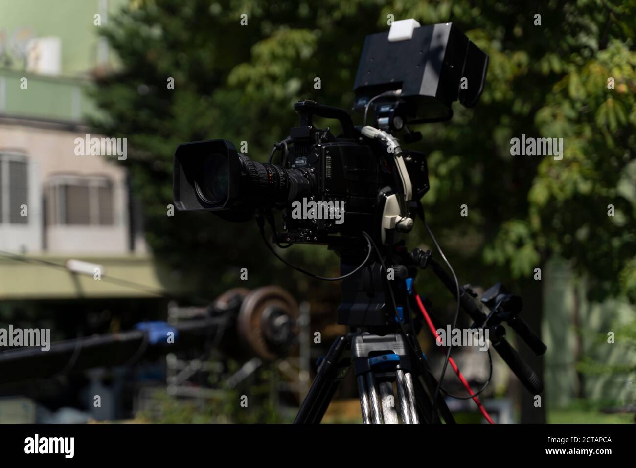 Video camera - Ready for recording show in outdoor TV studio - focus on ...