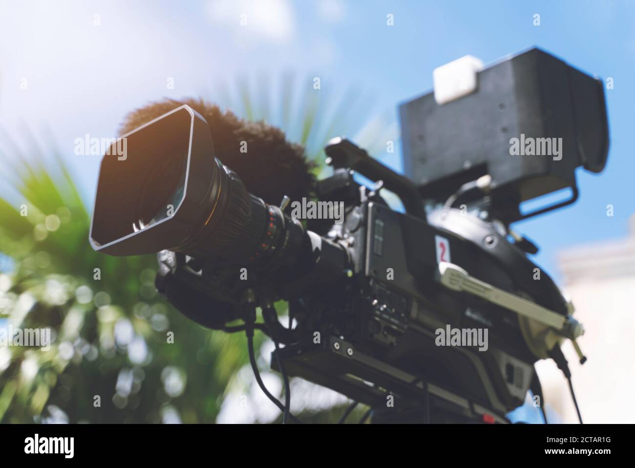 Video camera - Ready for recording show in outdoor TV studio - focus on ...