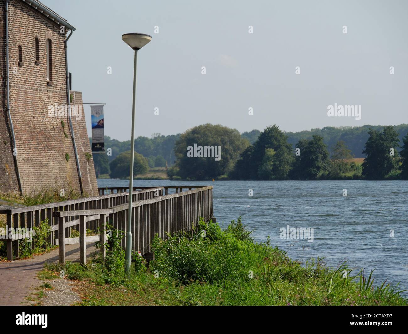 the dutch village kessel at the river maas Stock Photo - Alamy