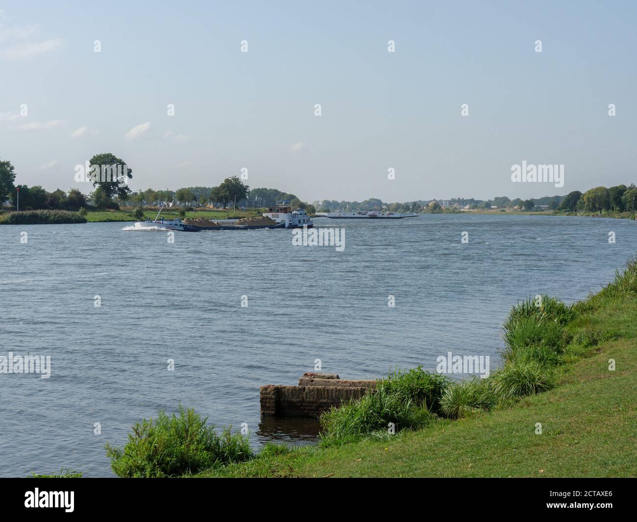 the dutch village kessel at the river maas Stock Photo - Alamy