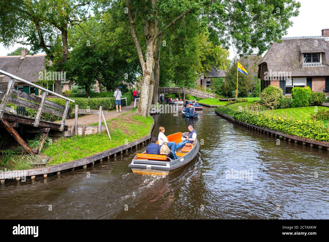 Giethoorn, Netherlands - 13 September 2020. Tourists sailing on rented ...