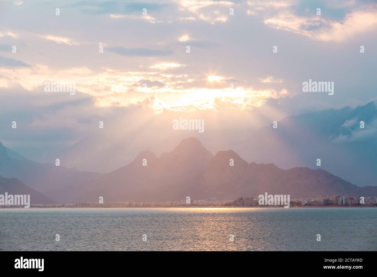 Scenic view of famous turkish Konyaalti Beach on the sunset. The ...