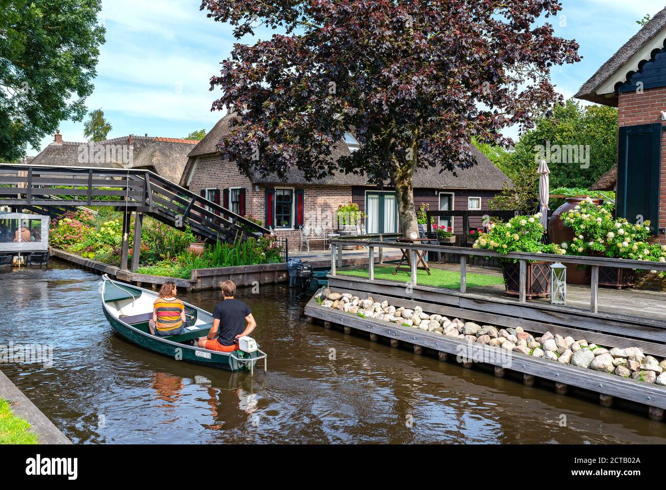 Giethoorn, Netherlands - 13 September 2020. Tourists sailing on rented ...
