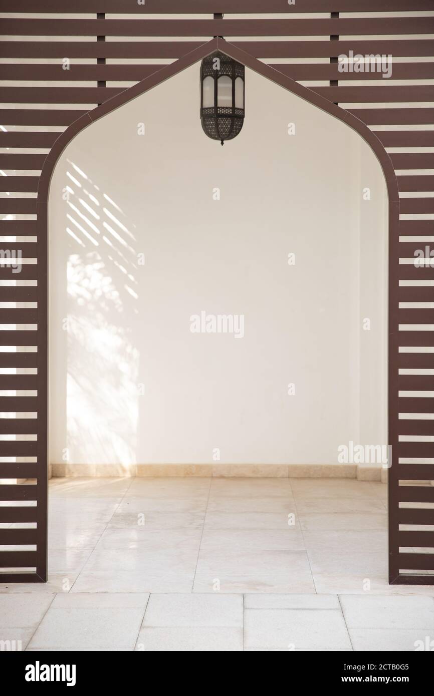 Arch and lamp by the residential buildings. Al Mouj, The Wave, Muscat ...