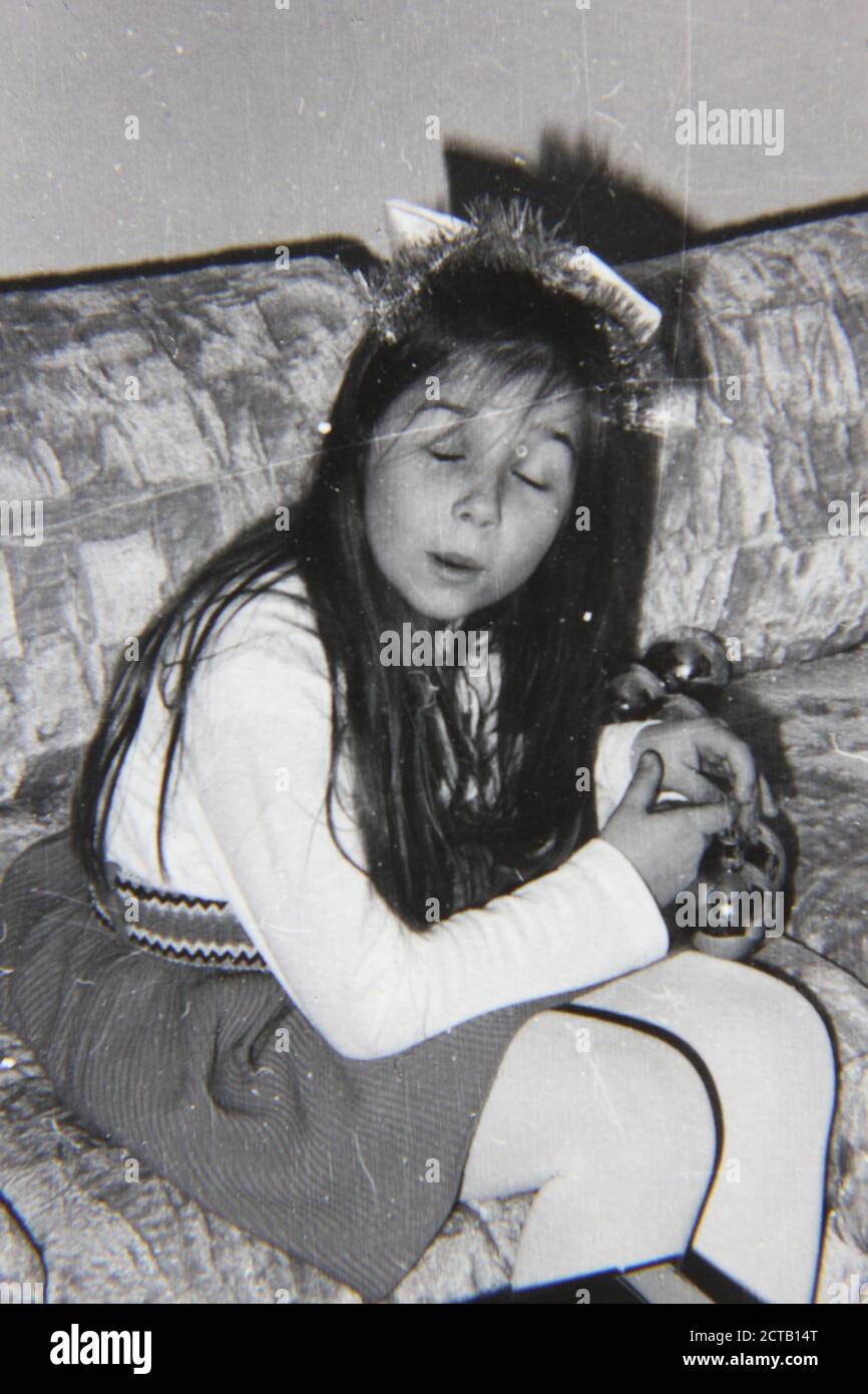 Fine 1970s black and white photography of a young girl lounging at home ...