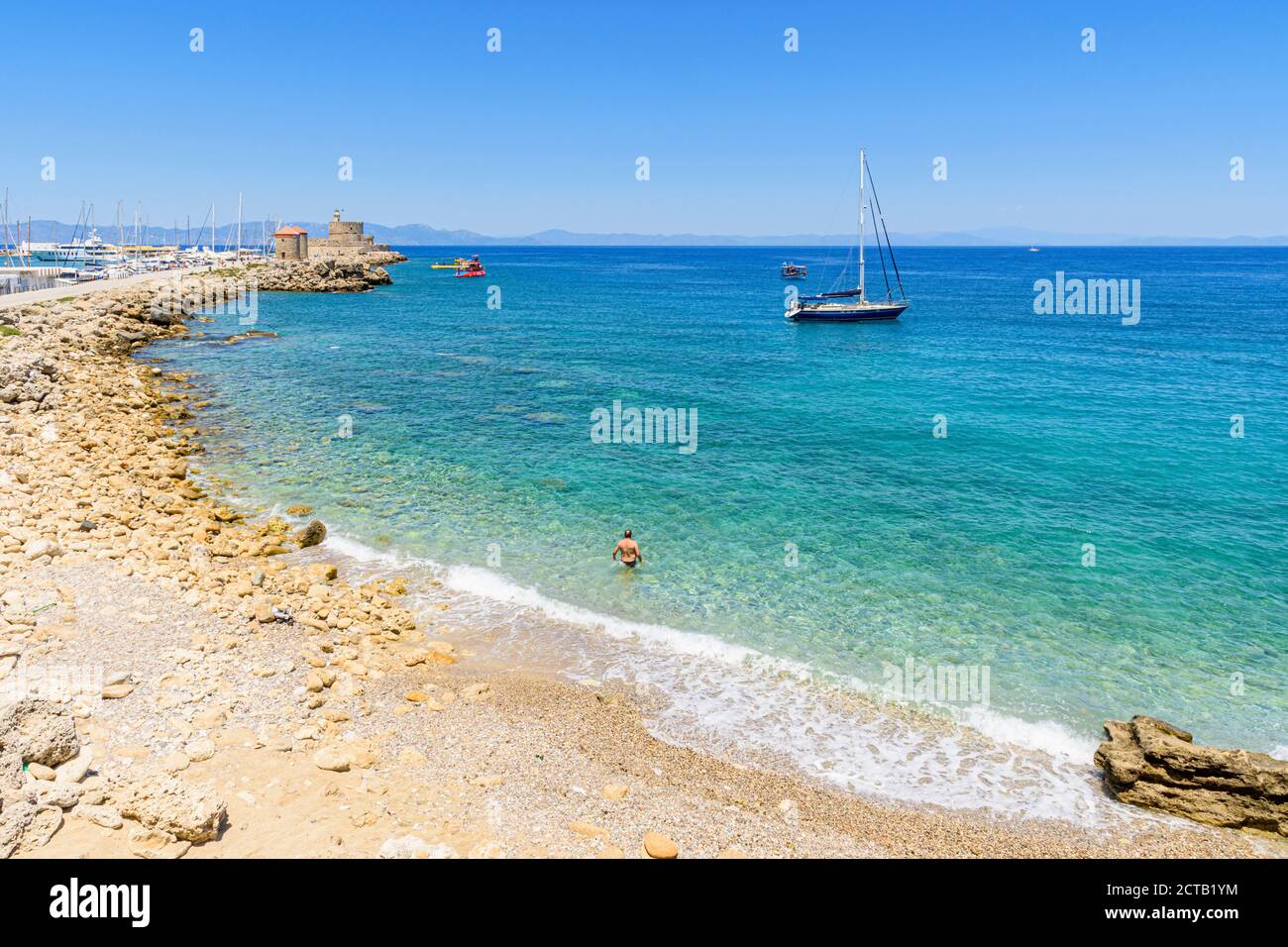 The pebble town beach on the seaward side of Rhodes Town jetty Rhodes ...