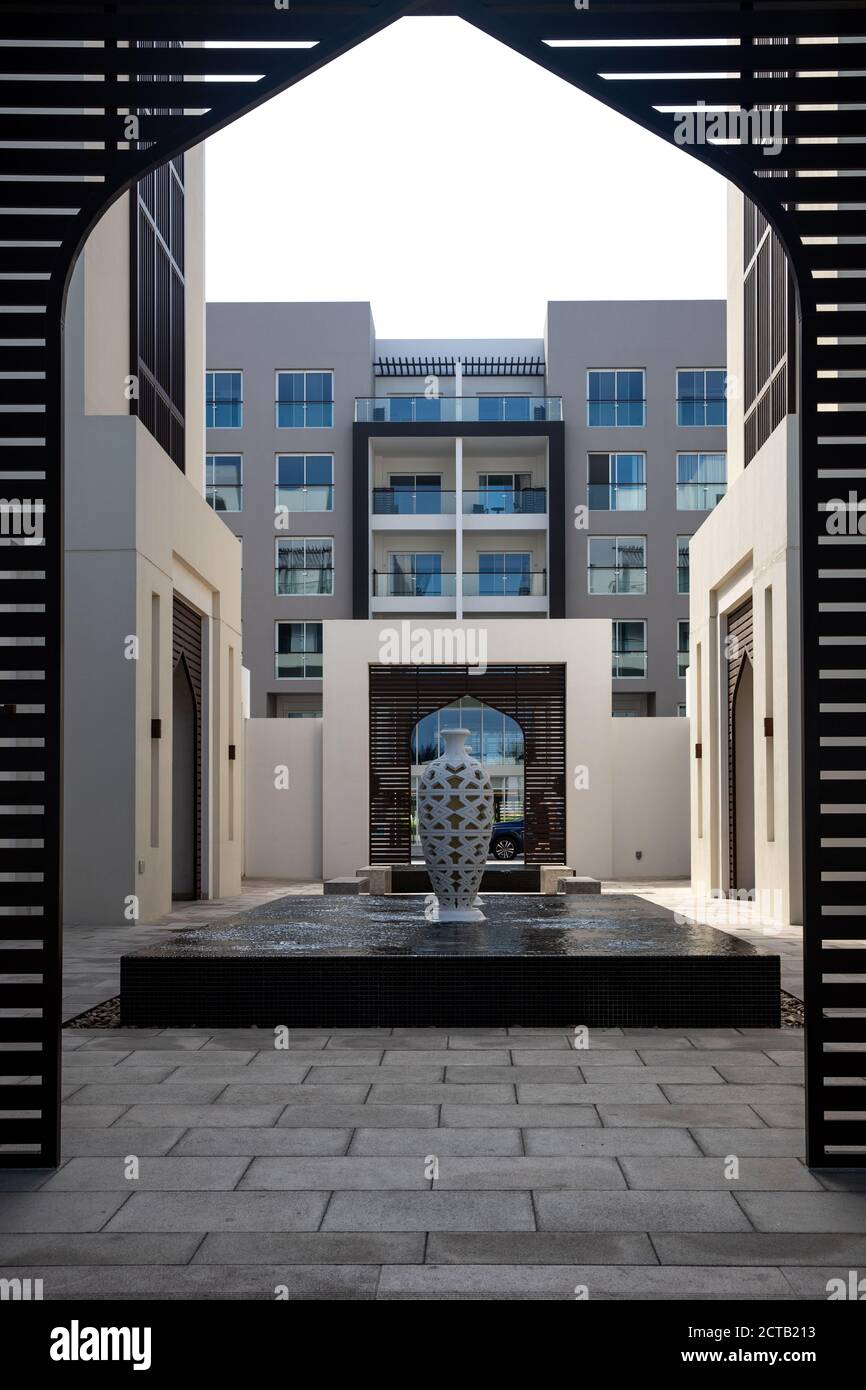 Water features, fountain by the residential buildings close to the ...