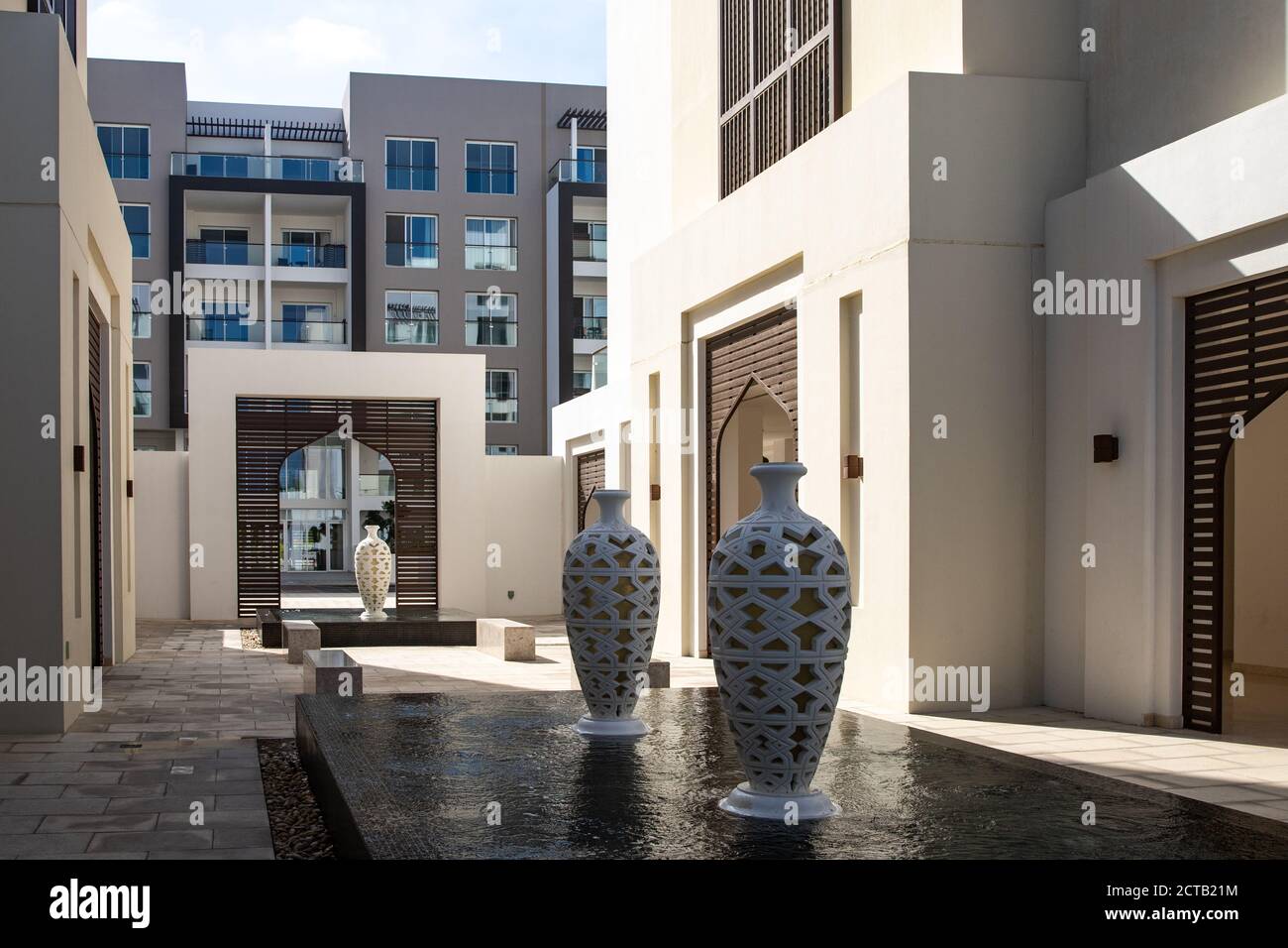 Water features, fountain by the residential buildings close to the ...