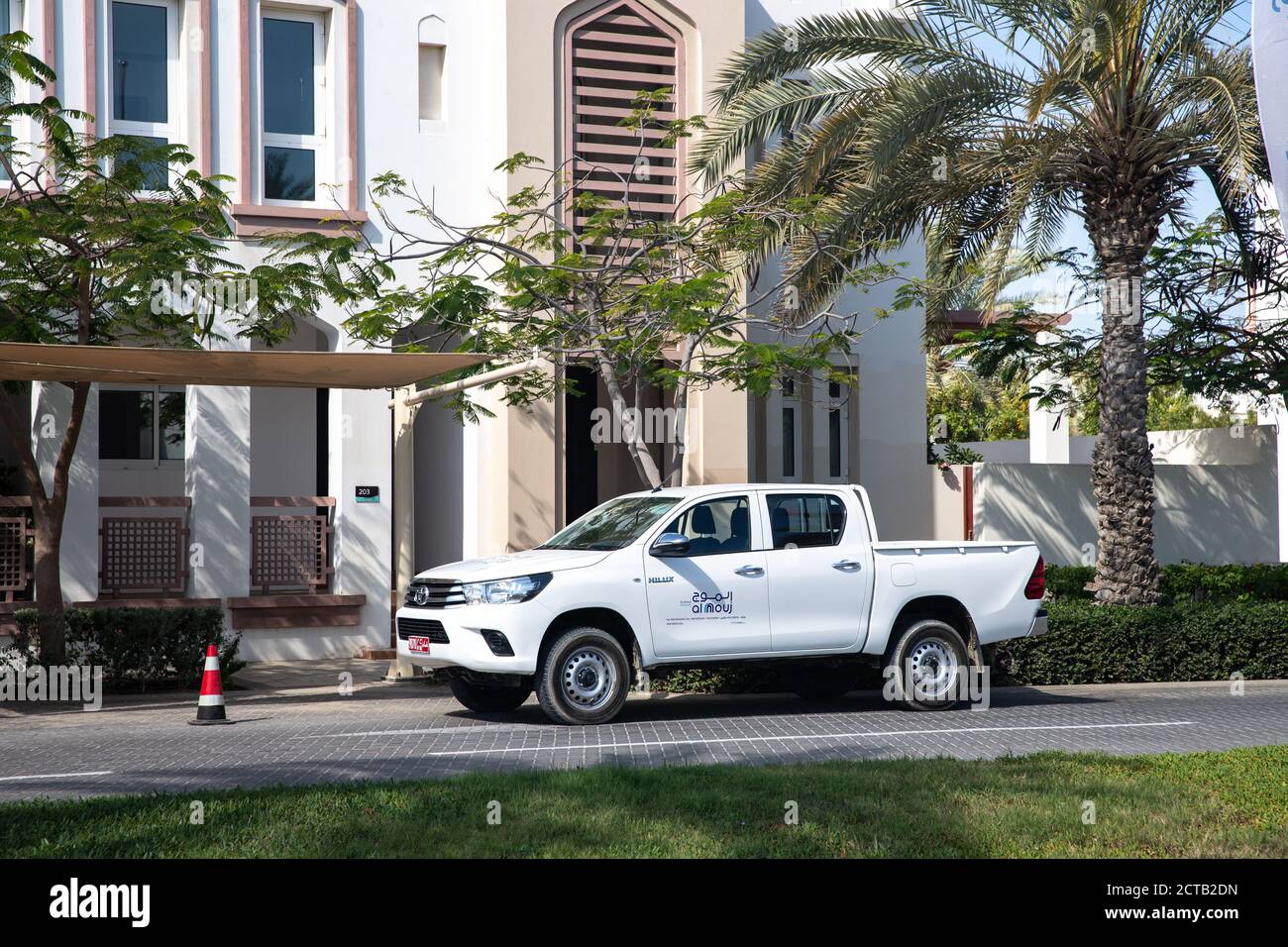 Security vechicle parked in front of townhouses. Residential area in ...