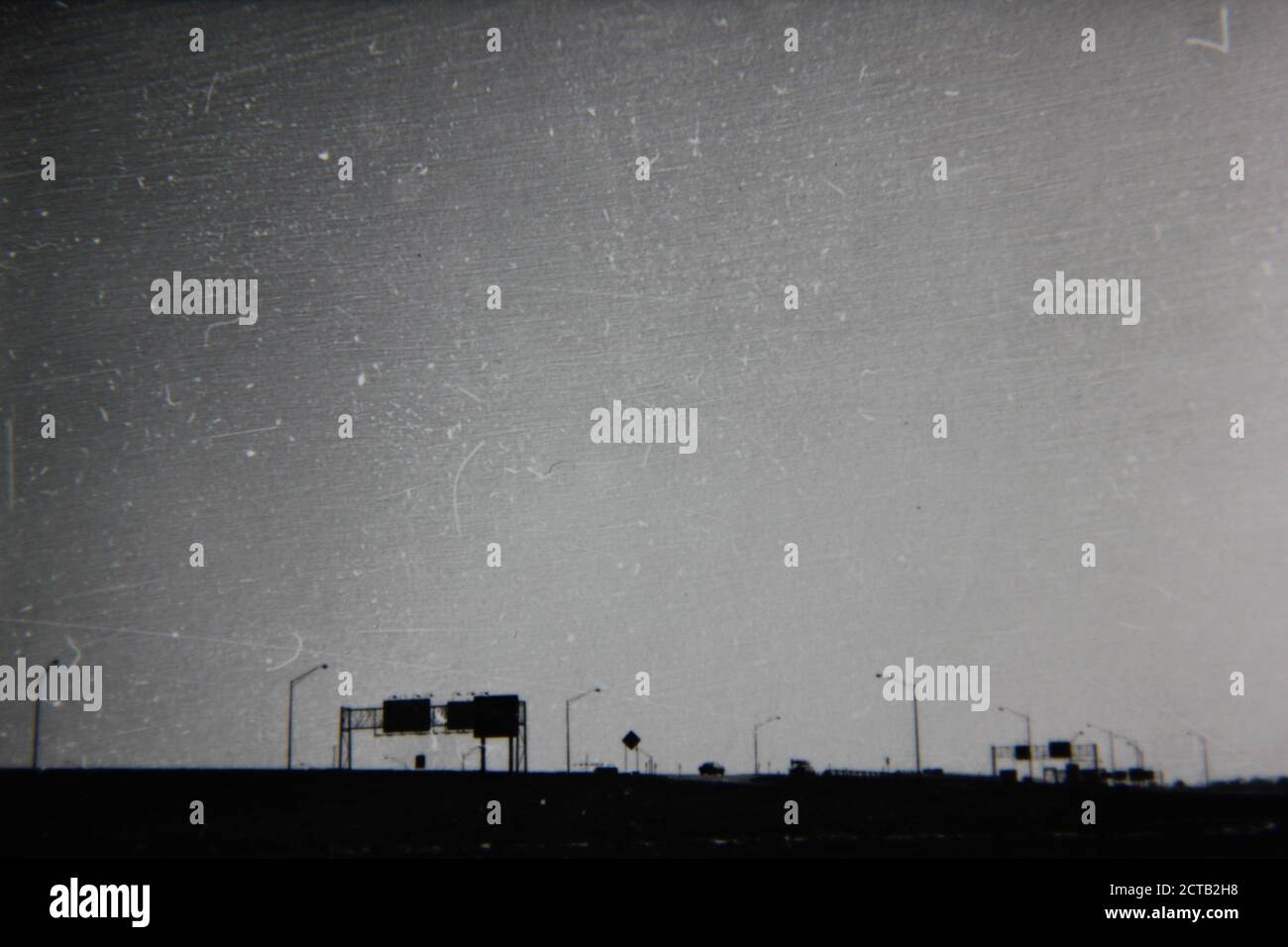 Fine 1970s black and white photography of highway signs during a cross ...