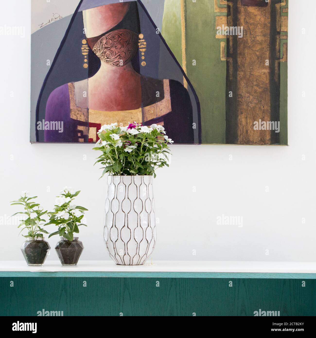 Interior with picture of arabic woman and floers pots from a luxourious ...