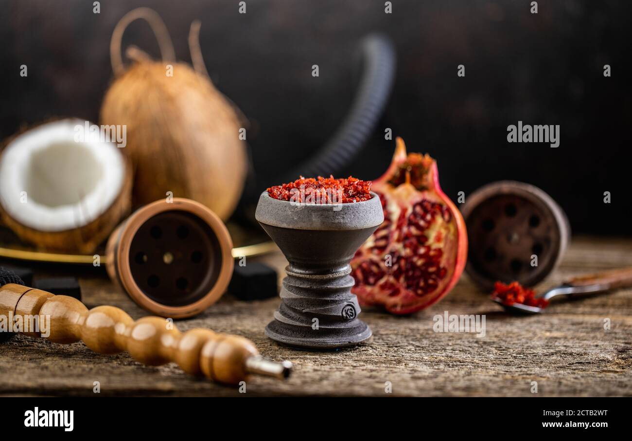Arabian stone hookah head filled with pomegranade flavoured tobacco ...