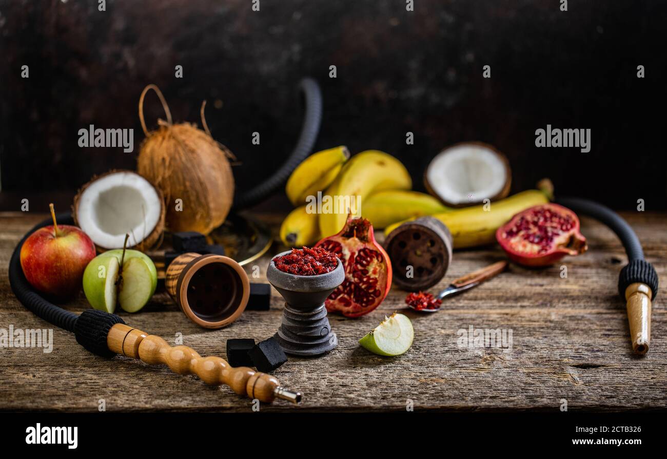 Arabian stone hookah head filled with pomegranade flavoured tobacco ...