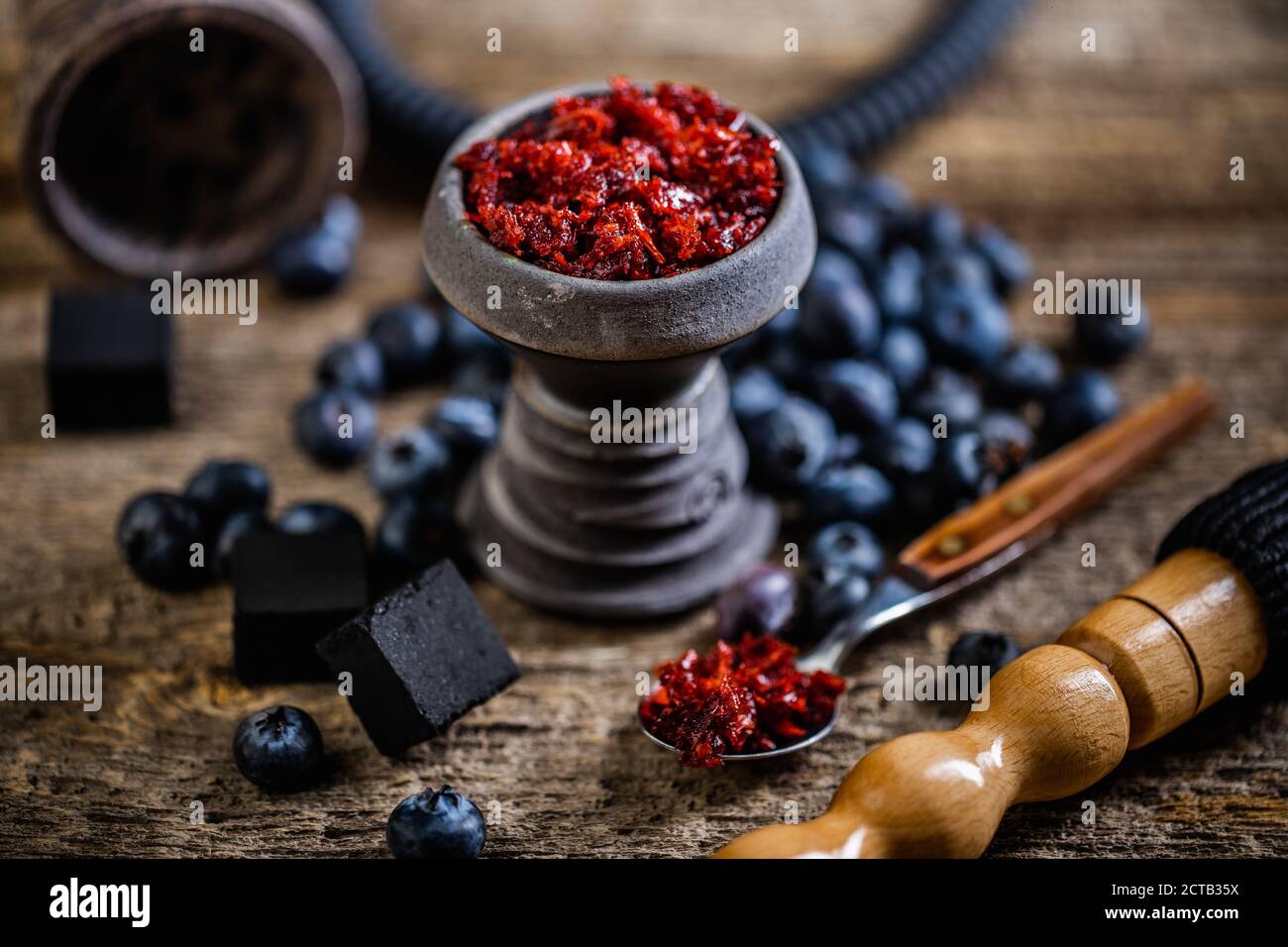 Arabian stone hookah head filled with blueberry flavoured tobacco Stock ...