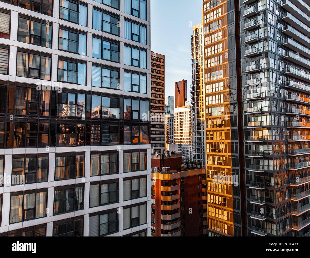 Modern tall glass buildings in downtown Stock Photo - Alamy
