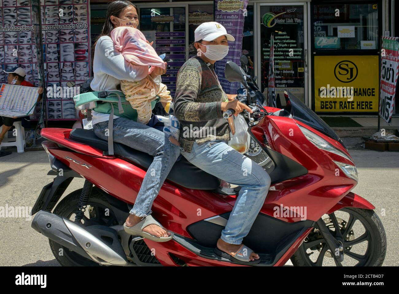 Woman Child Motorcycle High Resolution Stock Photography and Images - Alamy