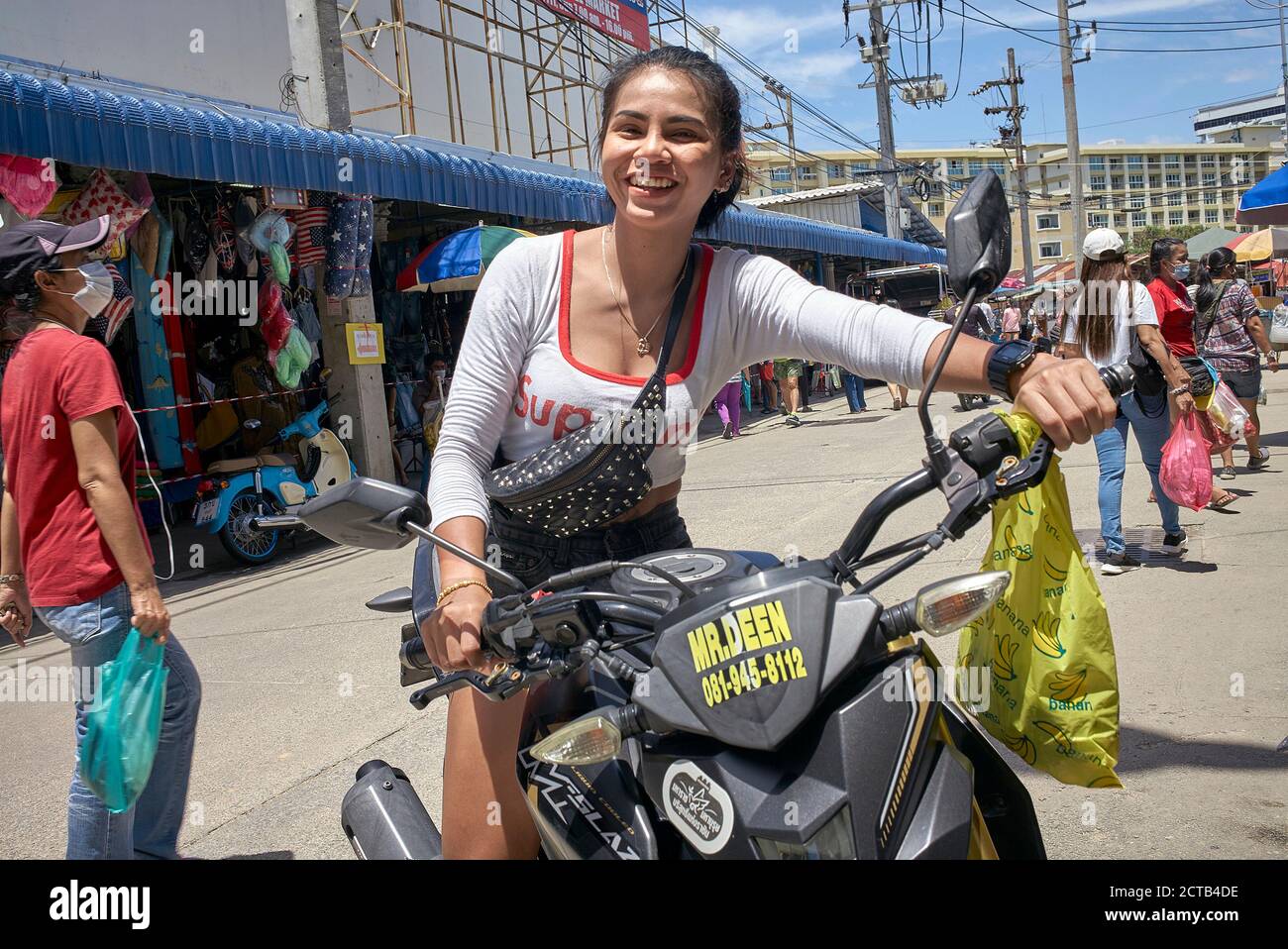 Girl riding a motorcycle. Thailand Southeast Asia Stock Photo - Alamy