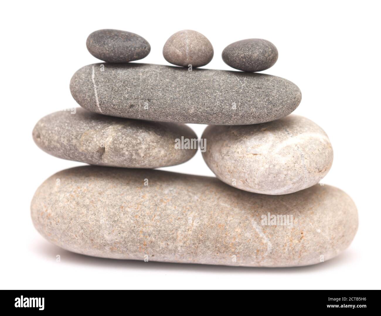 Balancing stones isolated on white background Stock Photo - Alamy