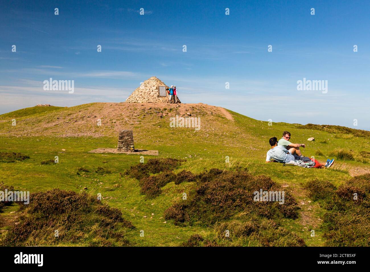 Walkers at the commemorative summit cairn on Dunkery Beacon – the ...
