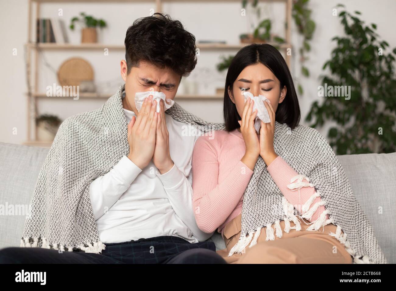 Sick young couple having hi-res stock photography and images - Alamy