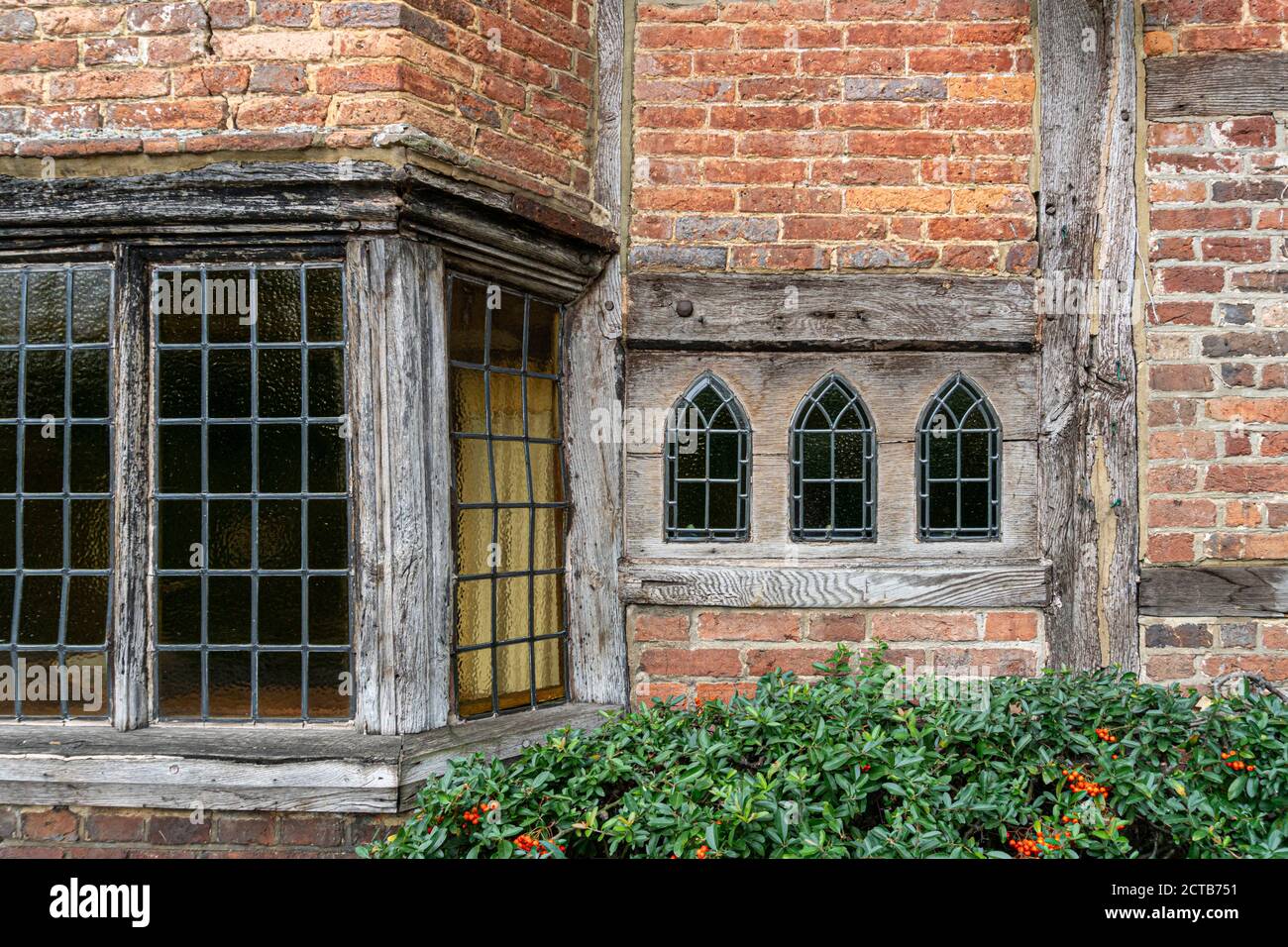 Detail of an ancient wooden window on an historic brick building Stock ...