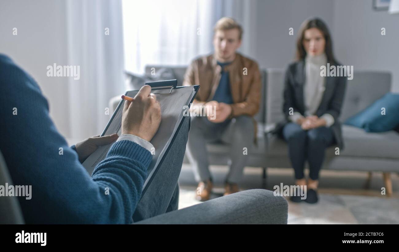 Couple on a Counseling Session with Psychotherapist. Foreground Focus ...