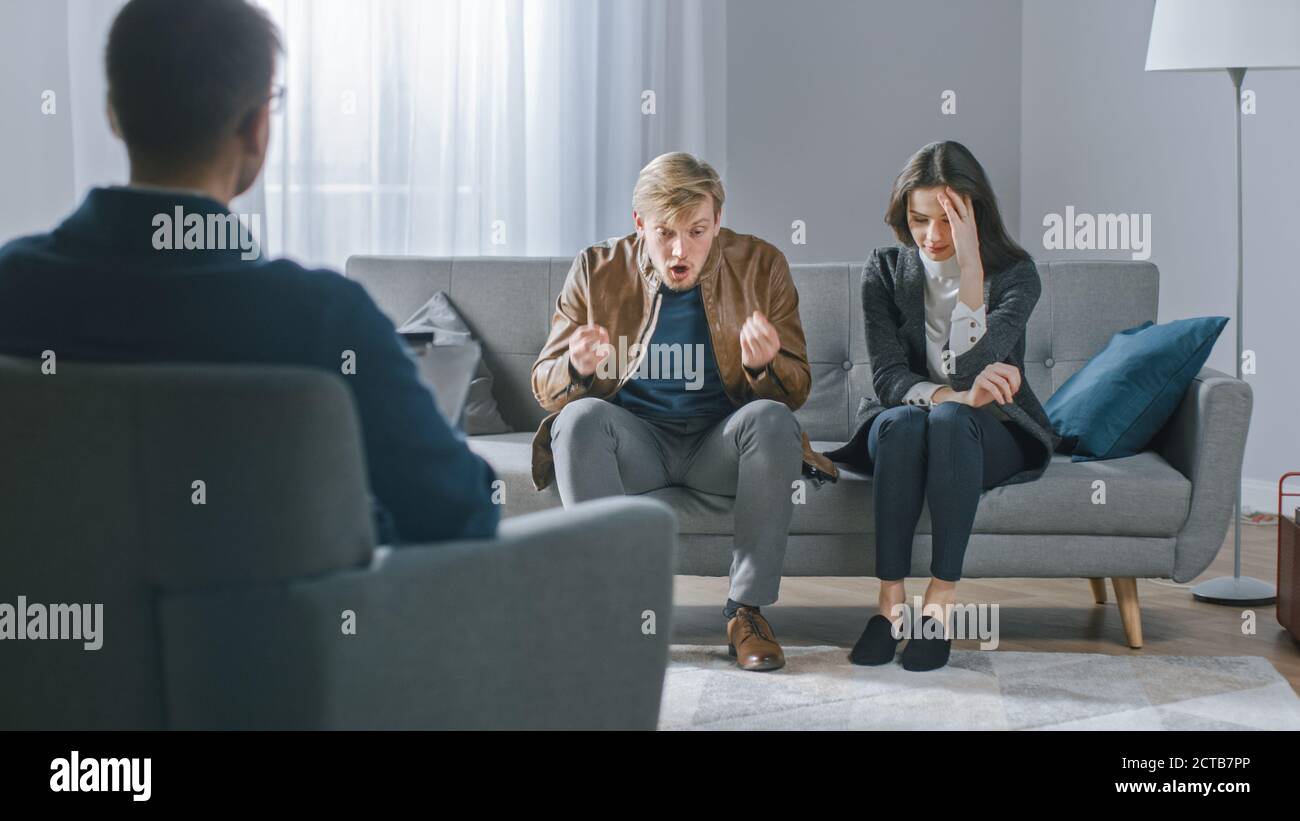 Young Couple on Counseling Session with Psychotherapist. Back View of ...