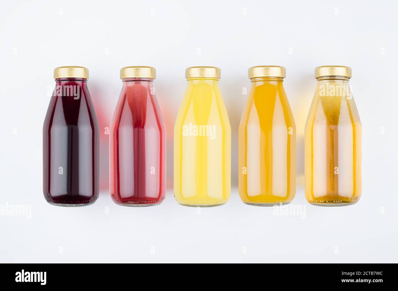 Collection of fresh various fruits juices - muddy and transparent in ...