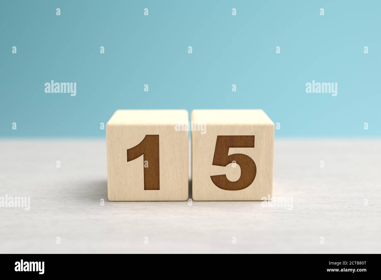 Wooden toy blocks forming the number 15 Stock Photo - Alamy