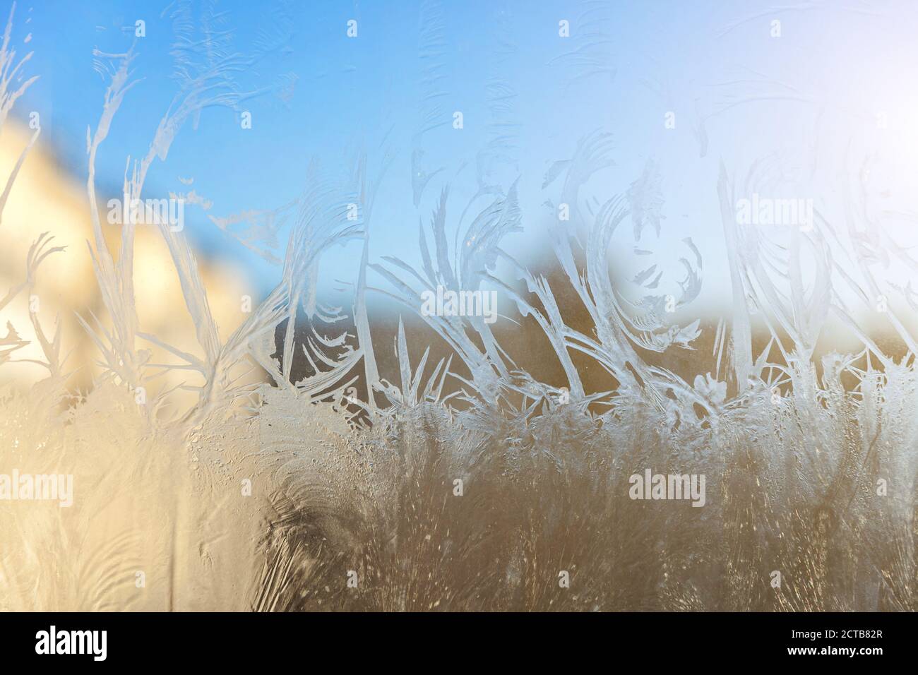 Frozen winter window with shiny ice frost pattern texture. Christmas ...