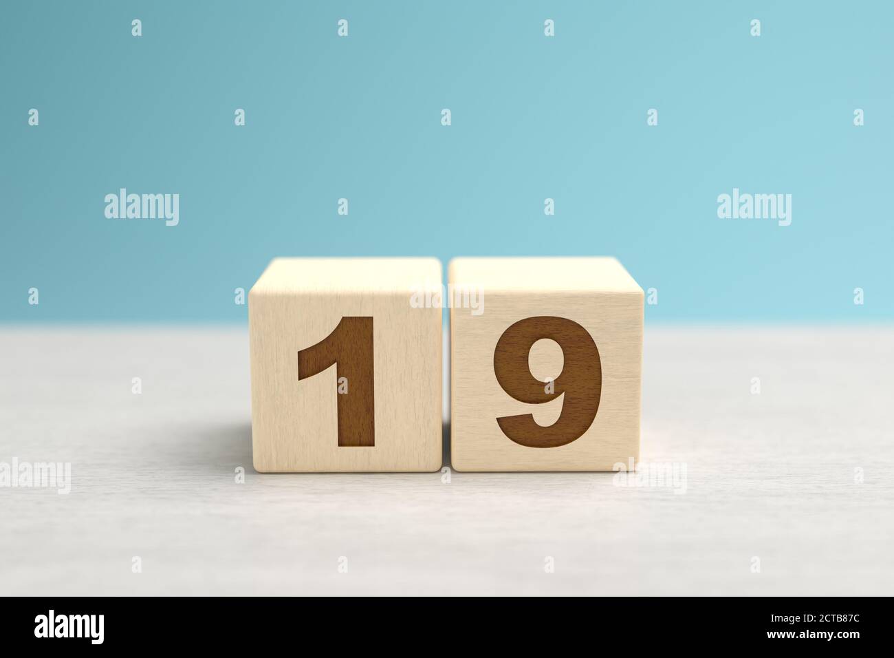 Wooden toy blocks forming the number 19 Stock Photo - Alamy
