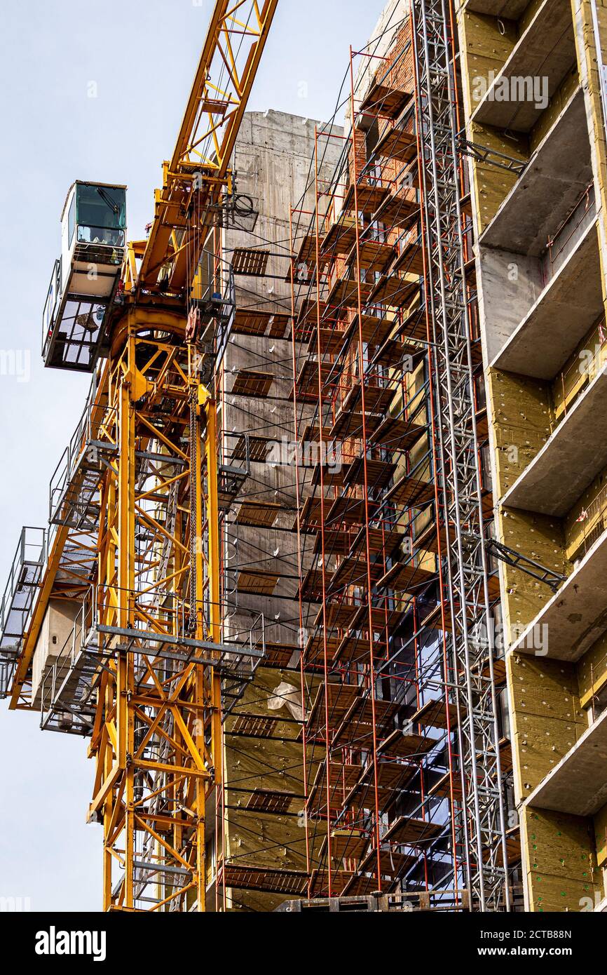 Fragment of an unfinished concrete and brick building under ...