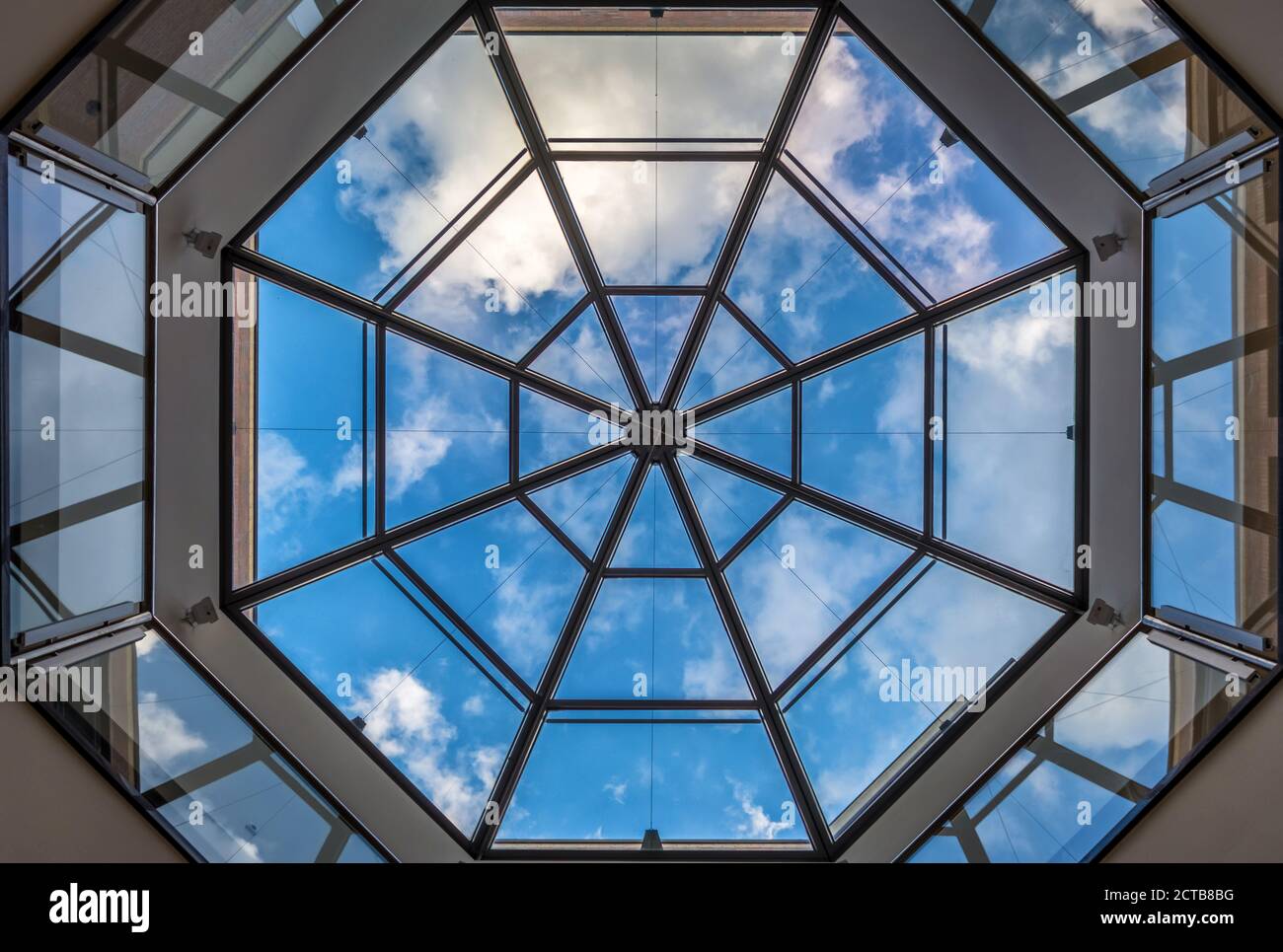 Geometric glass dome in the roof of a building Stock Photo - Alamy