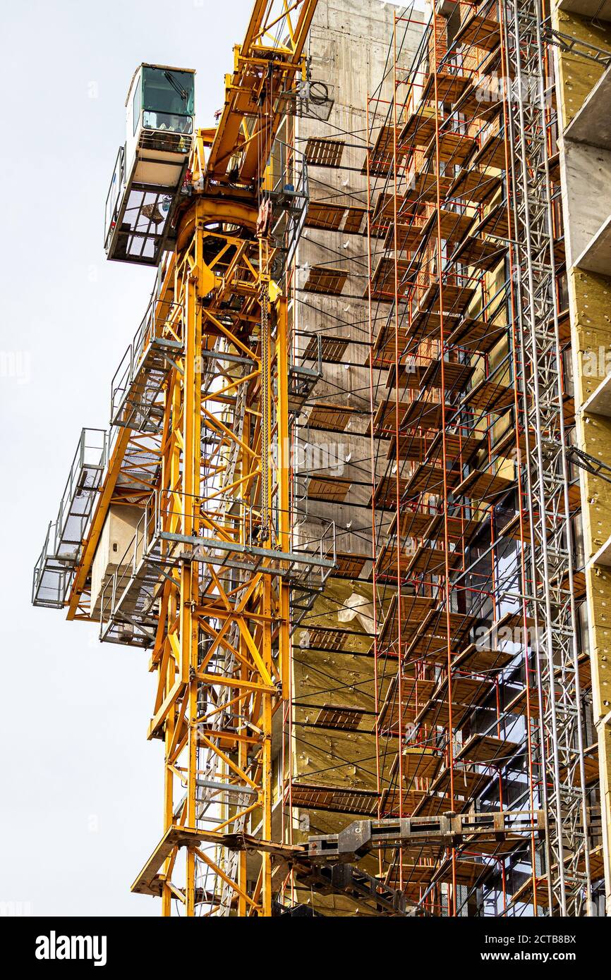 Fragment of an unfinished concrete and brick building under ...