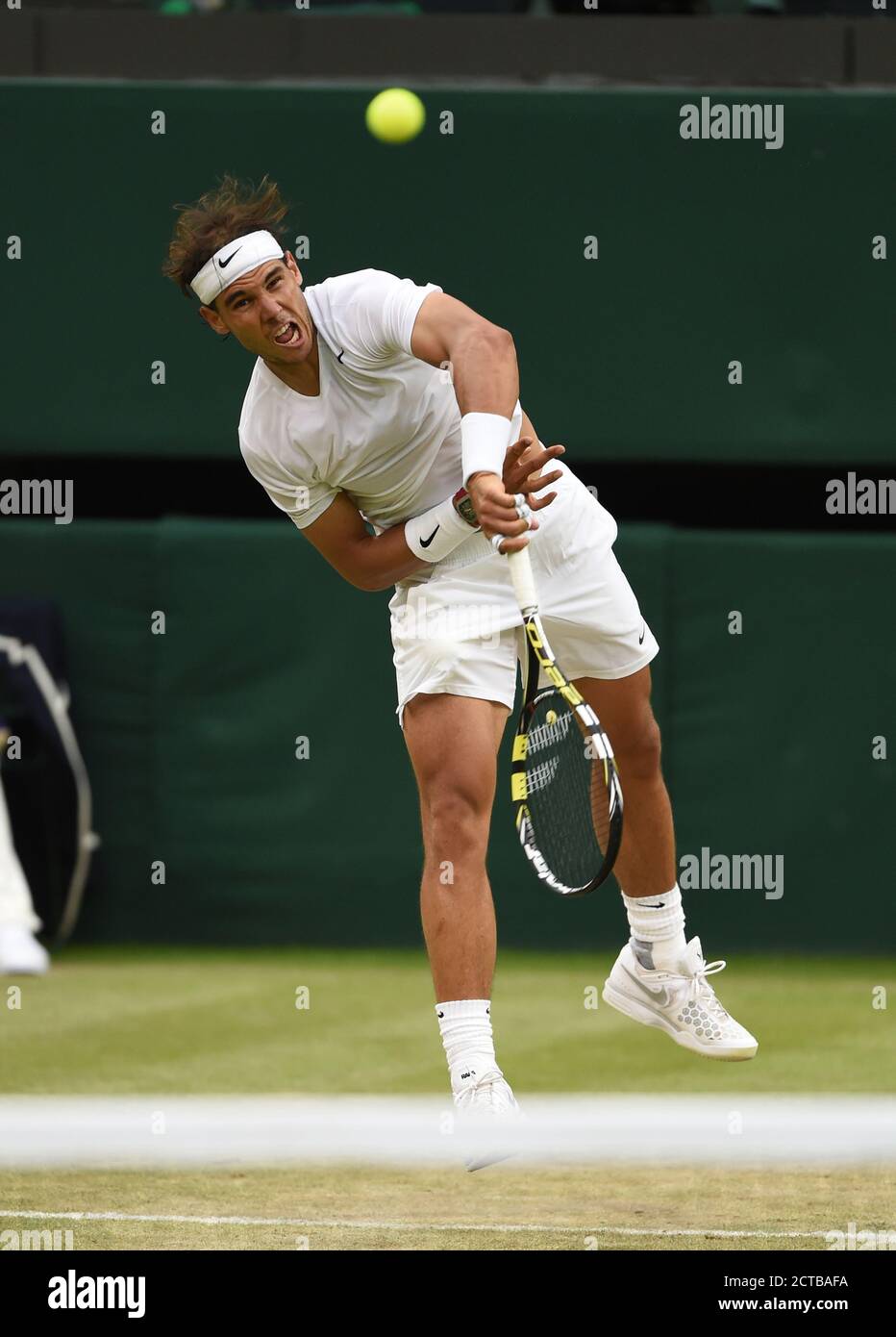 Mikhail Kukushkin v Rafael Nadal. WIMBLEDON TENNIS CHAMPIONSHIPS 2014. Picture Credit : © Mark ...