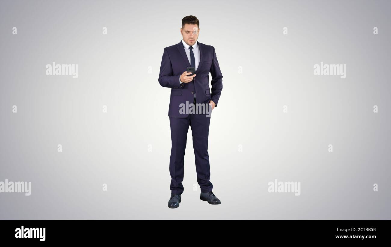 Serious worried businessman trying to call someone and can't get Stock ...