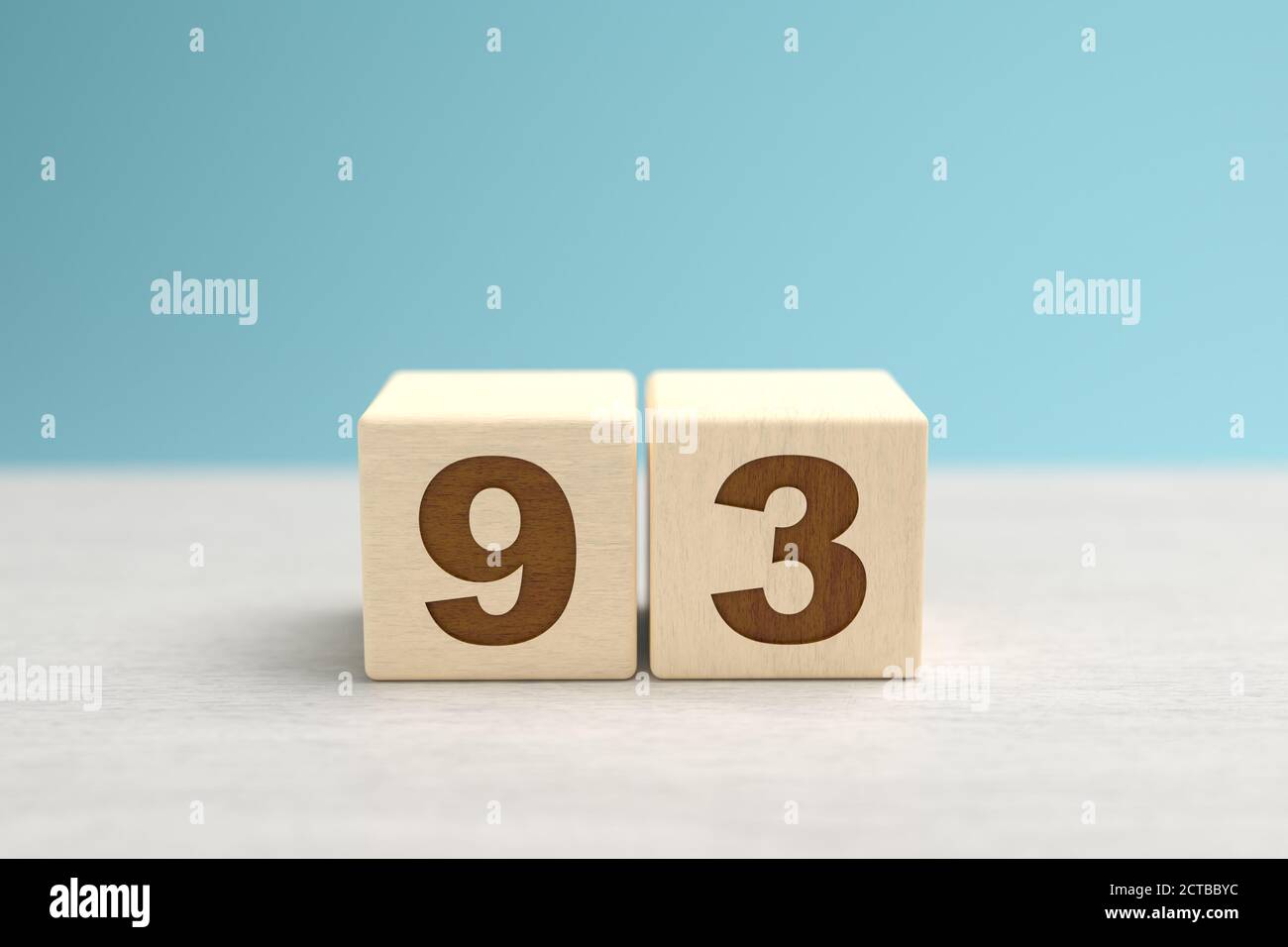 Wooden toy blocks forming the number 93 Stock Photo - Alamy